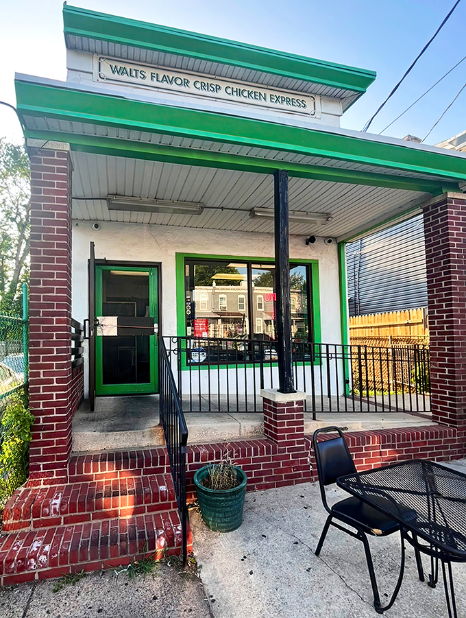 Walt's distinctive green trim frames a temple of fried chicken perfection &ndash; where crispy dreams come true one piece at a time.