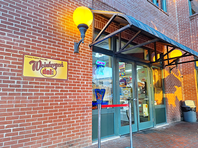 Historic brick and classic awnings create the perfect setting for traditional deli magic.