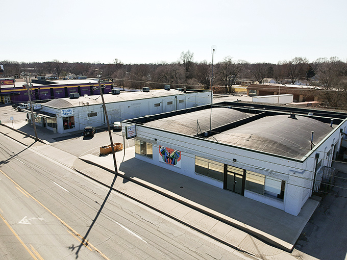 An aerial view reveals the impressive size of this thrift store complex. Those white buildings contain more bargains than you could explore in a day.