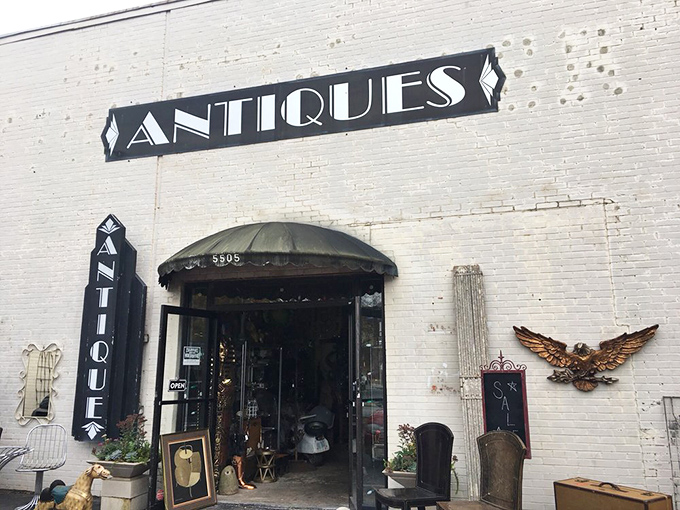 That classic "ANTIQUES" sign is like a beacon calling to every treasure hunter within a fifty-mile radius.