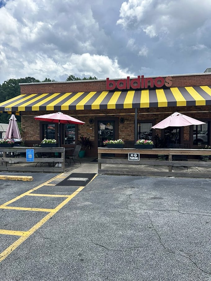 The cheerful awning looks like it was borrowed from a 1950s ice cream parlor! Baldinos combines brick, sunshine, and sandwich magic &ndash; a recipe for happiness on any cloudy day.