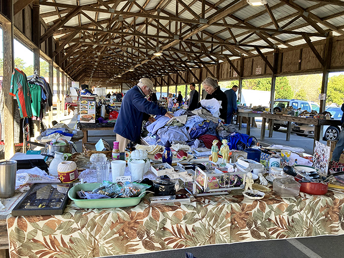 Inside the covered building, organized booths create a comfortable shopping experience filled with toys, tools, and treasures.