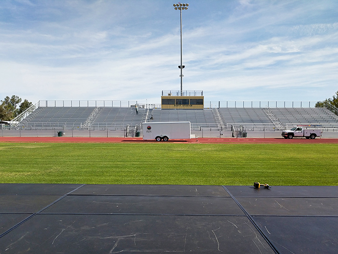 The local high school stadium proves even small desert towns know how to build community spirit.