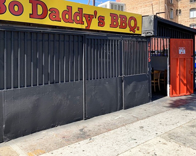 The outside whispers plain, but step in and taste bold, unforgettable barbecue charm.