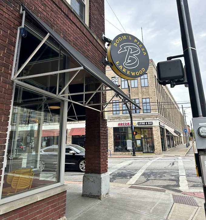 Those big windows invite you in like an old friend, promising pizza conversations and memorable meals.