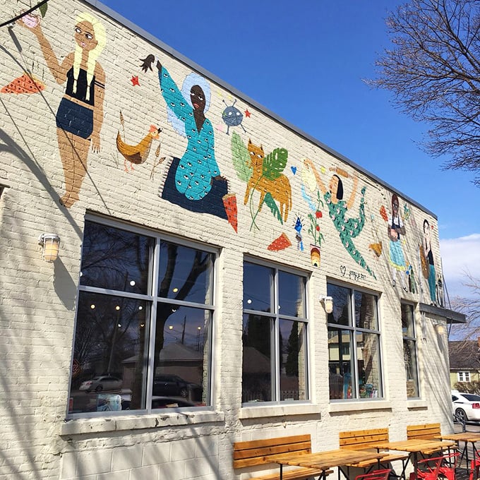 Sometimes the most colorful murals hide the most delicious neighborhood pizza secrets.