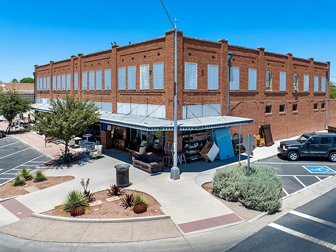 This classic brick building in Coolidge represents small-town charm where your Social Security check actually covers the rent.