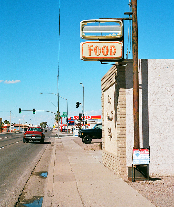 Coolidge: A cafe that promises nothing more than "FOOD" is my kind of honest establishment. Simple pleasures in the desert sun.