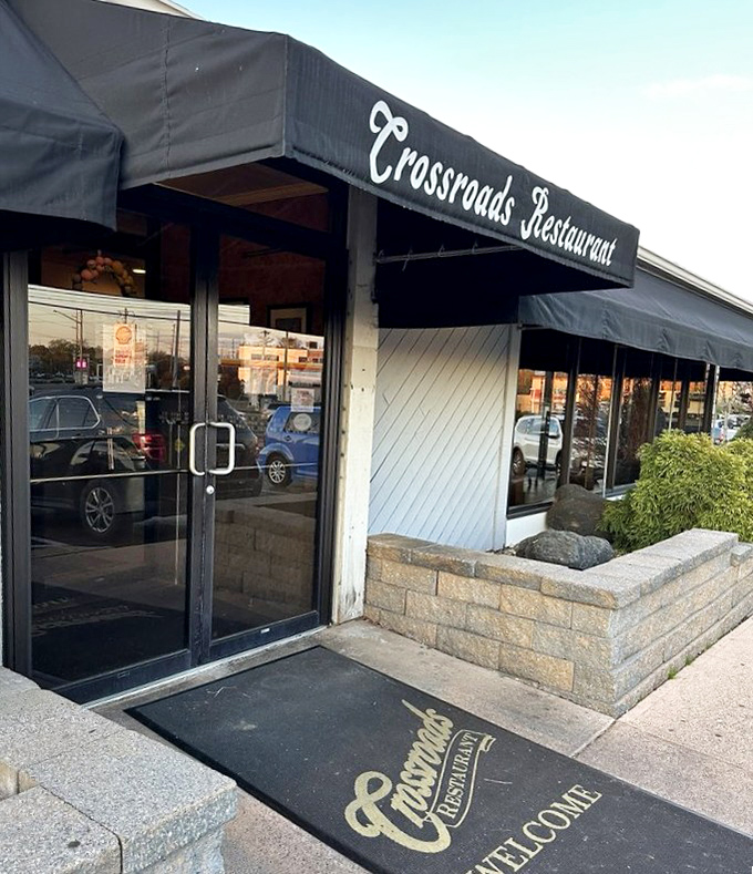 Those stone planters and welcoming entrance promise the kind of burgers worth crossing town for.