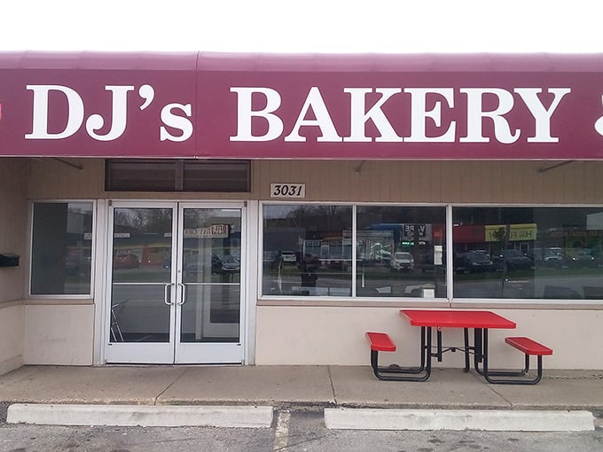 Simple red picnic tables invite you to sit and savor &ndash; Ann Arbor's unpretentious donut haven.