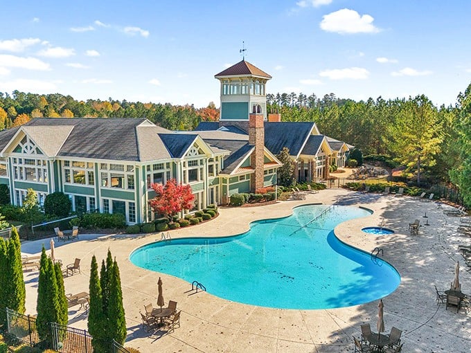 The clubhouse and pool glisten in the Georgia sunshine—proof that the golden years can actually look golden.