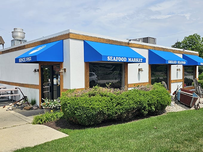 This unassuming white building with blue trim houses seafood so fresh it might just flip onto your plate itself.