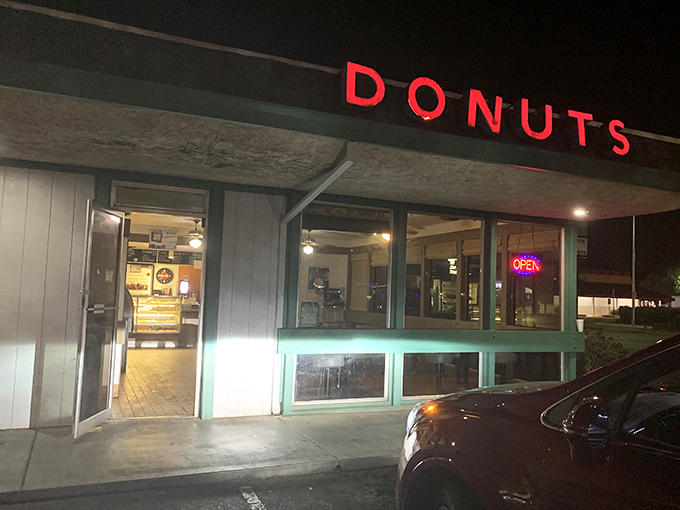 When the neon "Open" sign glows, you know fresh donuts and warm welcomes await just inside.