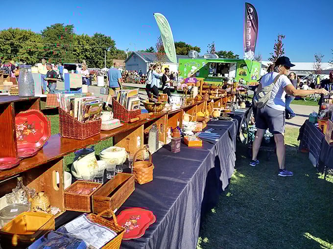 Those display tables could star in their own HGTV show. "Flea Market Flip" has nothing on this setup. 