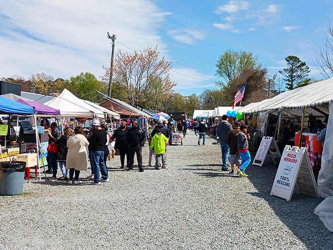 Gravel pathways lead shoppers between tents filled with potential discoveries. The hunt is often more exciting than the catch!