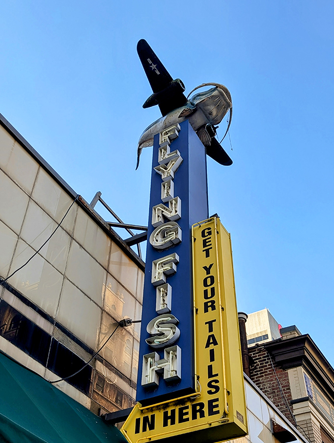 That vertical sign stands tall like a beacon calling all seafood lovers home to roost.