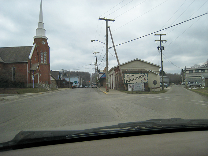 Fredericksburg's general store with a cyclist passing by - where "one-stop shopping" has meant the same thing for 150 years.