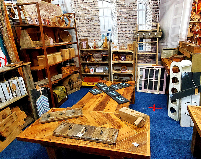 Inside, vintage lighting and carefully arranged booths create an antique wonderland that feels like stepping into yesterday.