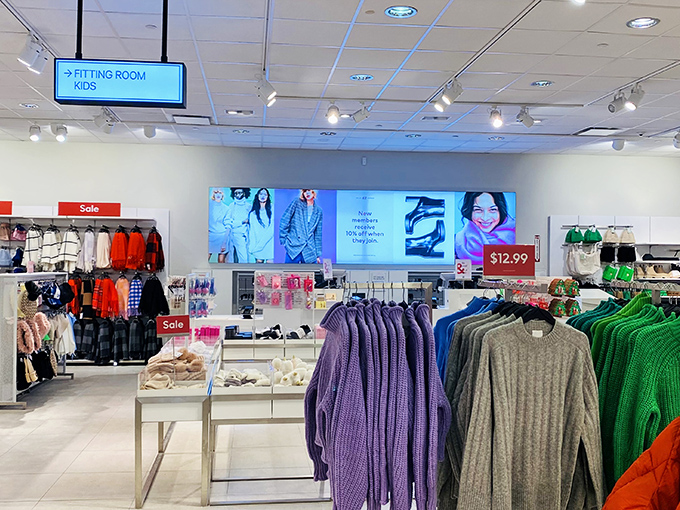 Colorful merchandise creates a rainbow of possibilities where every rack holds potential wardrobe game-changers waiting.