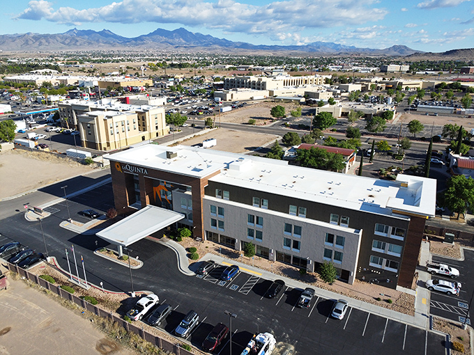 Classic brick buildings line the street like old friends sharing tales of better times.