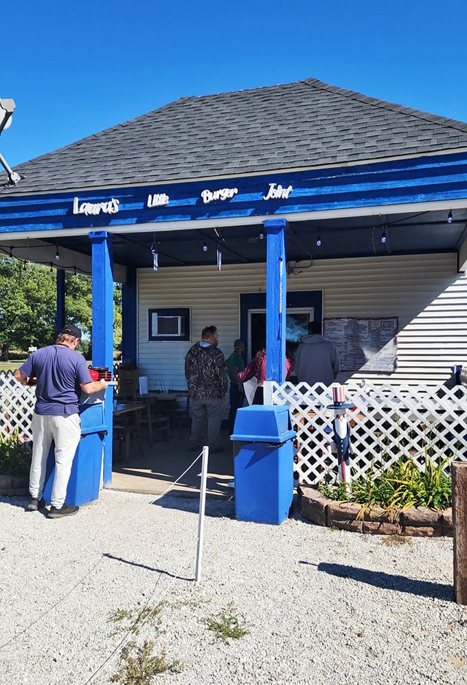 Small-town charm painted bright blue, where every burger comes with a side of warmth.