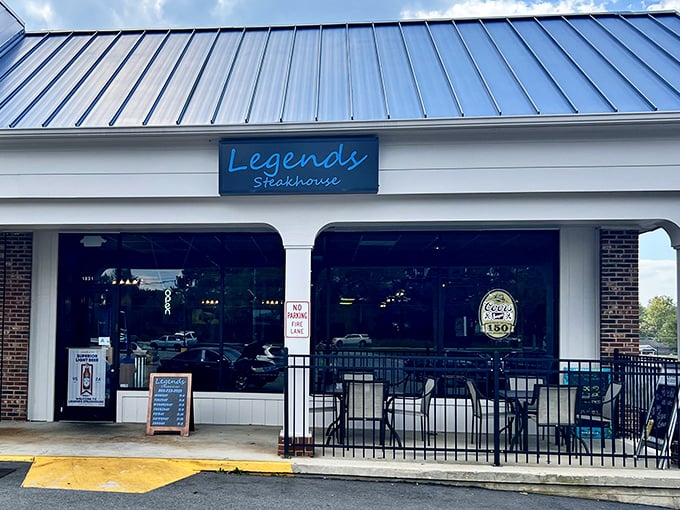 The blue sign glows like a beacon for steak lovers, calling you to discover Newberry's delicious secret spot.