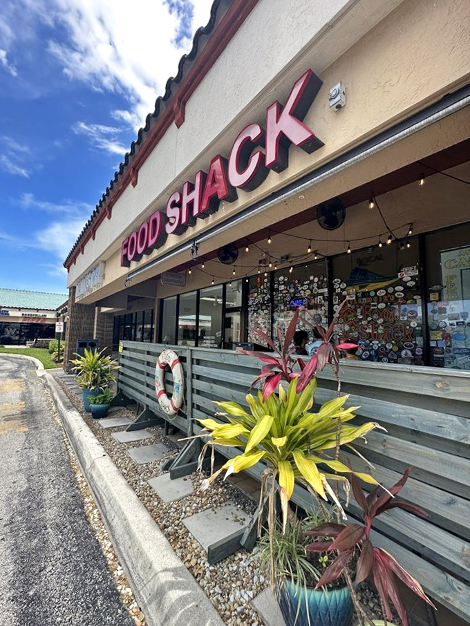 That wall of stickers at Food Shack tells the story of countless happy diners who couldn't wait to leave their mark.