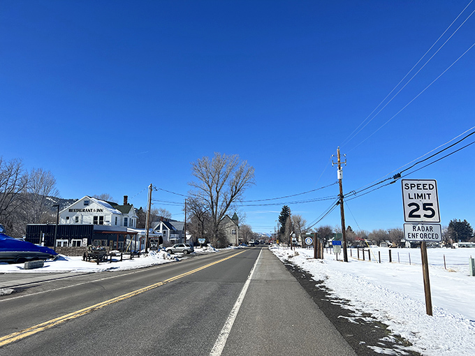 Even covered in snow, this tiny town's charm shines brighter than any big city skyline view.
