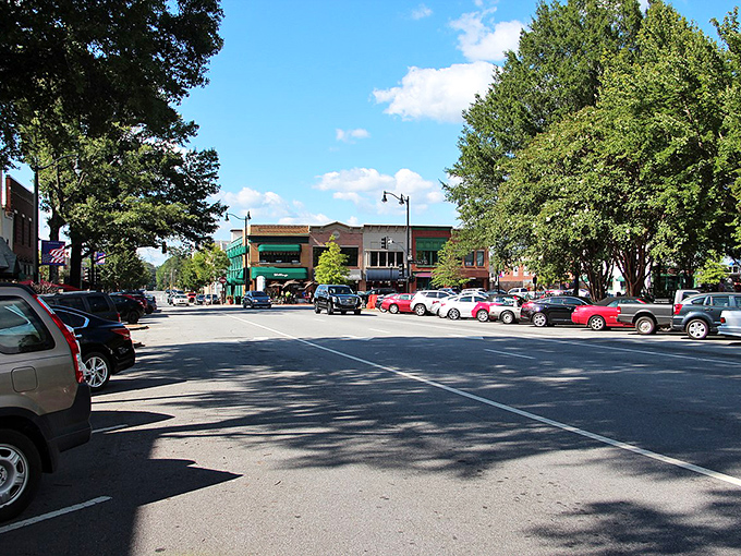 Marietta's main drag: where cars park beneath a canopy of Georgia green! Small-town charm with big-city shopping options&mdash;Mayberry meets "Project Runway."