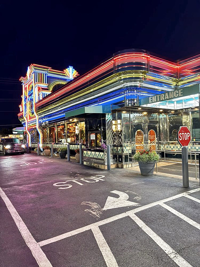 Those neon lights don't just illuminate the building - they illuminate your path to breakfast heaven itself.