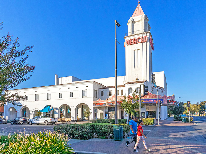 The historic Merced Theatre marquee beckons visitors to this revitalized downtown, where small-city culture thrives in California's heartland.
