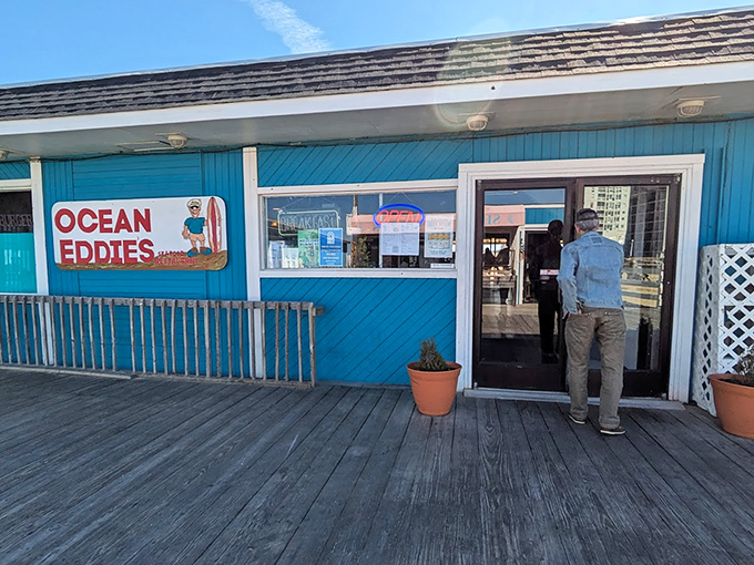 That bright blue exterior matches the ocean it overlooks. No need for fancy when you're serving seafood with a side of crashing waves.