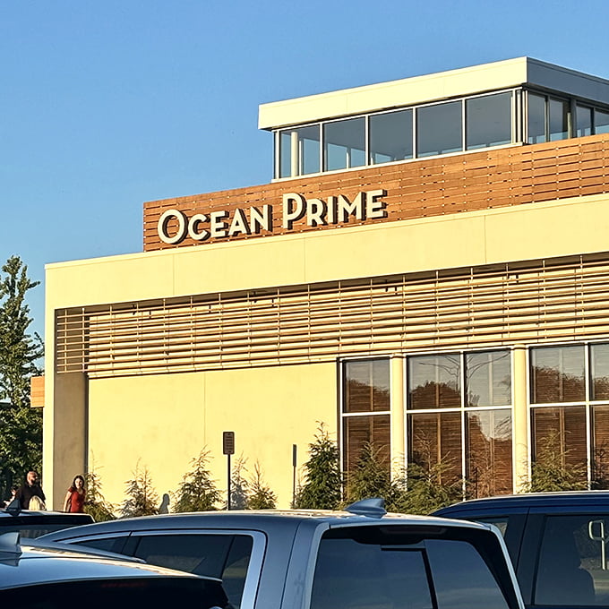 Modern lines and warm lighting make Ocean Prime's entrance as inviting as the seafood treasures that await beyond those doors.