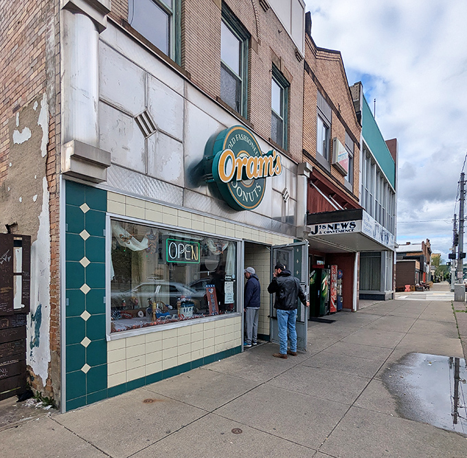 That green and white facade has been drawing donut lovers for generations - and counting.