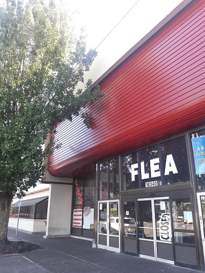 Oregon Flea Market's straightforward storefront hides its true nature. Behind that "FLEA" sign lies a world where one person's castoffs become another's treasures.