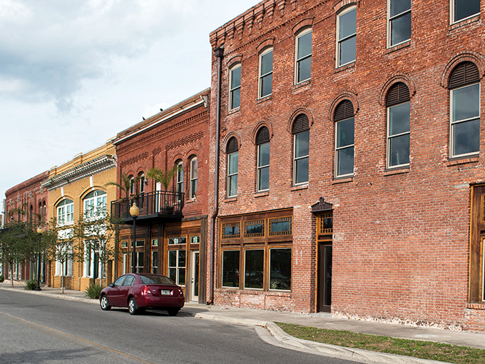 Classic brick architecture lines streets that remember when handshakes sealed deals and neighbors knew each other's names.