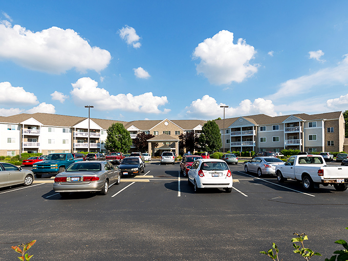 That parking lot tells the whole story - plenty of room for everyone's wheels and visiting grandkids.