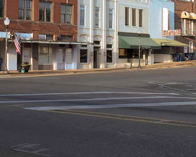 Golden hour bathes Pontotoc's historic facades in light that makes even budget living look absolutely magical.