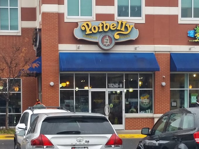 The cheerful yellow Potbelly sign brightens up this brick building. Some chain restaurants actually deliver on their comfort food promises!