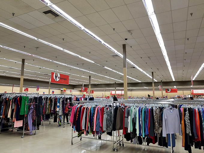 Inside this unassuming building, color-coded racks organize a universe of potential wardrobe transformations.