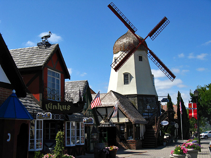 Half-timbered buildings and colorful facades create a Scandinavian dreamscape that makes your passport feel completely unnecessary.