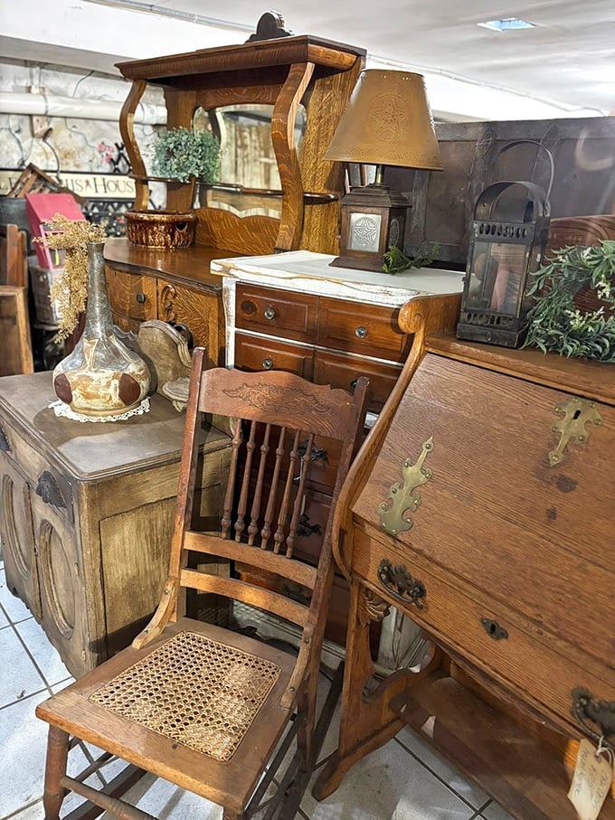 Nothing says "genuine country treasures" quite like wooden furniture arranged on a rustic covered porch.