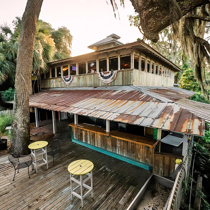 This weathered wooden deck at Sunbury isn't just a restaurant &ndash; it's a front-row seat to coastal Georgia's natural beauty.