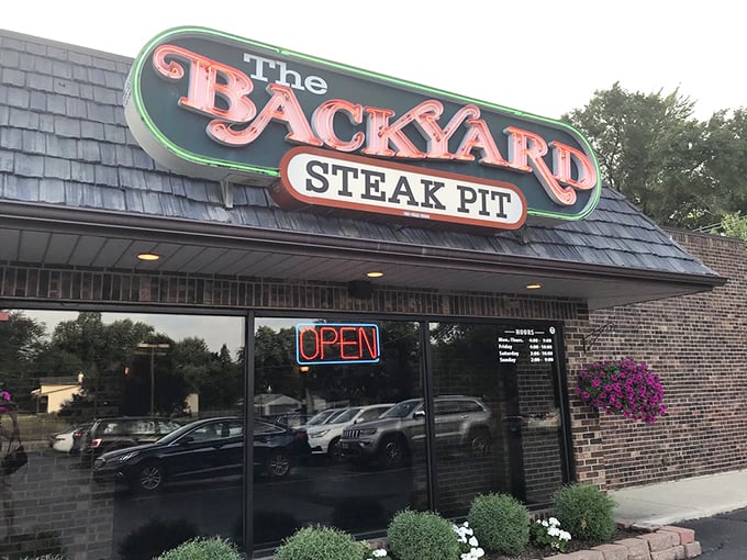 Classic neon steakhouse signage that's been calling hungry folks home since forever - timeless appeal. 