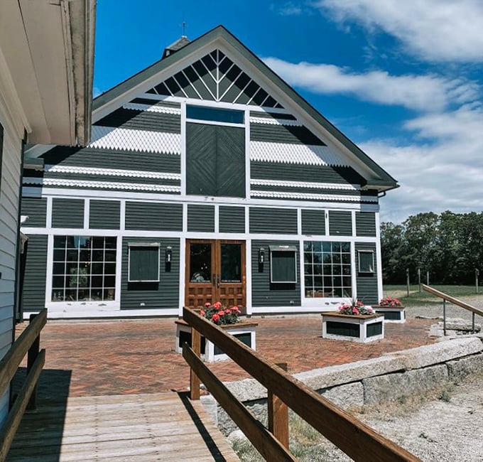 Sunlight plays across The Blessing Barn's distinctive facade &ndash; a thrifter's country retreat with purpose and charm.