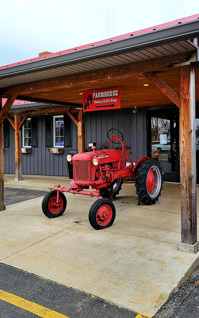 That red Farmall tractor isn't just decoration &ndash; it's a promise of authentic rural cooking inside The Farmer's Daughter.