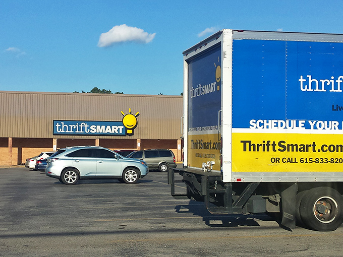 The blue truck signals fresh arrivals - because the best thrift stores never stop bringing new surprises.