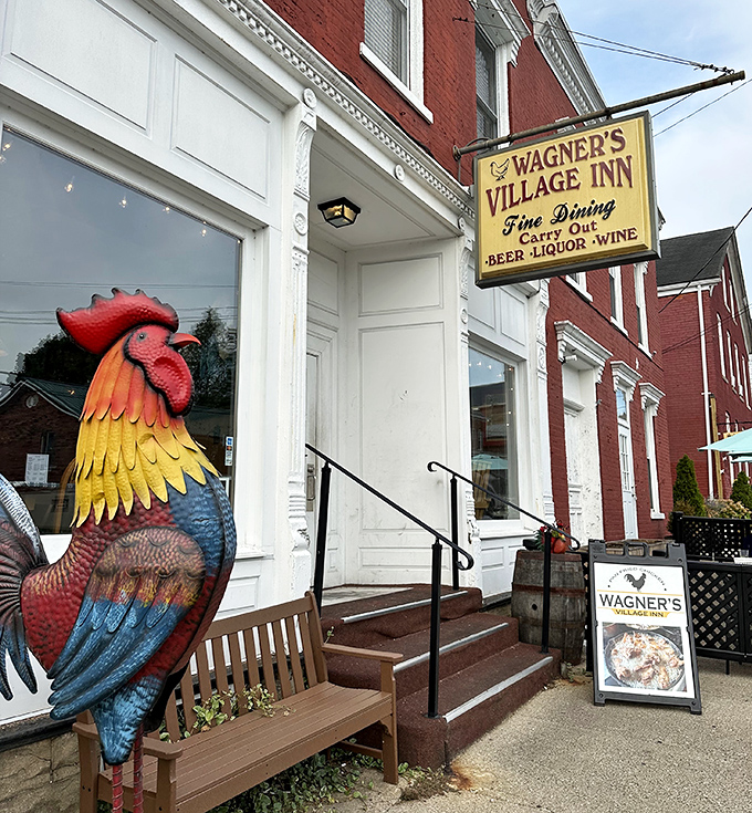 That colorful rooster statue isn't just decoration - it's a proud ambassador for the golden-fried goodness waiting inside Wagner's.