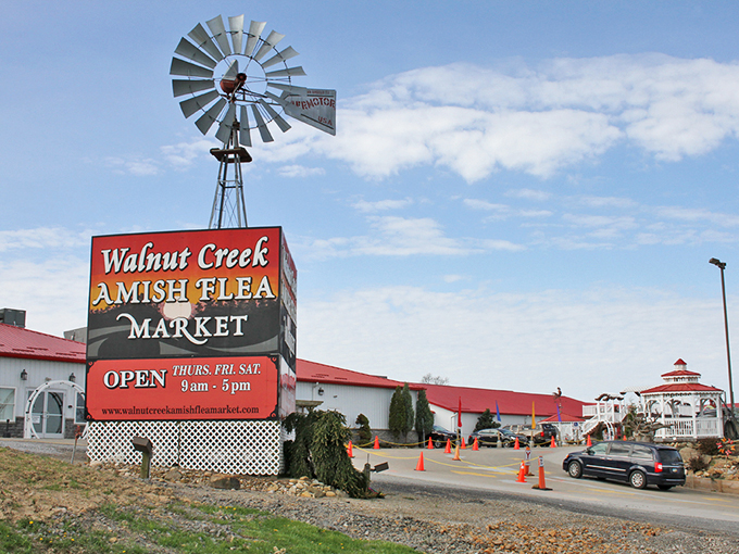 The Walnut Creek Amish Flea Market windmill signals treasure hunting adventures ahead.