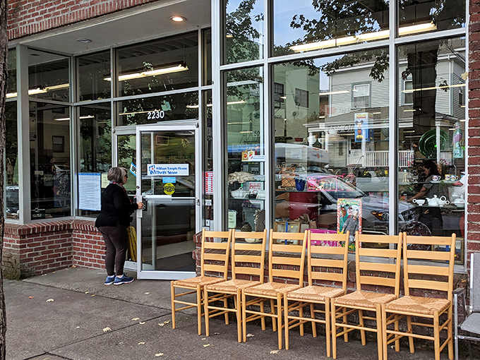 Those wooden chairs lined up outside are just a preview of the furniture bargains waiting inside.